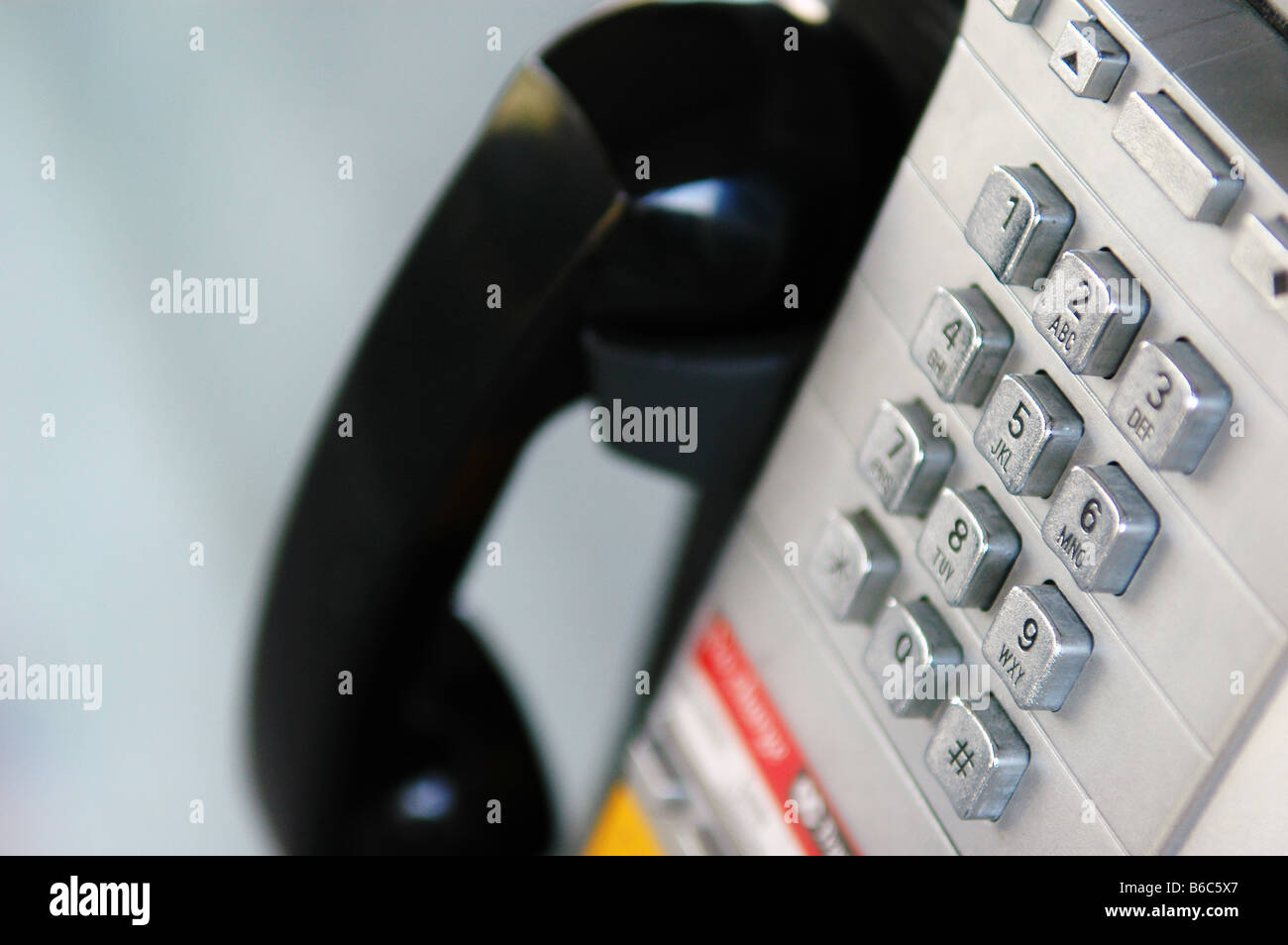 Traditional payphone with keypad and reciever Stock Photo - Alamy