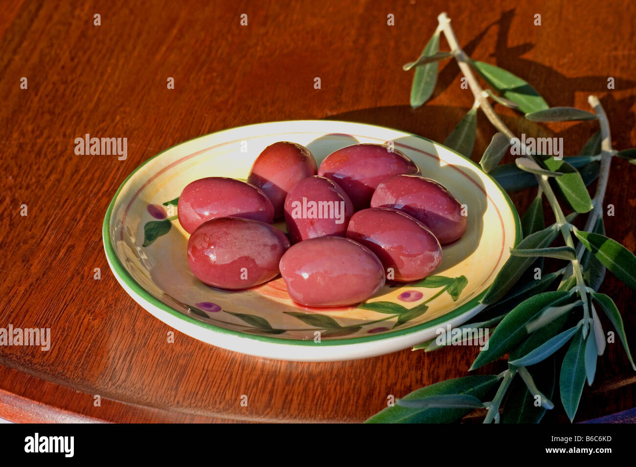 Red olives and leaves Stock Photo - Alamy