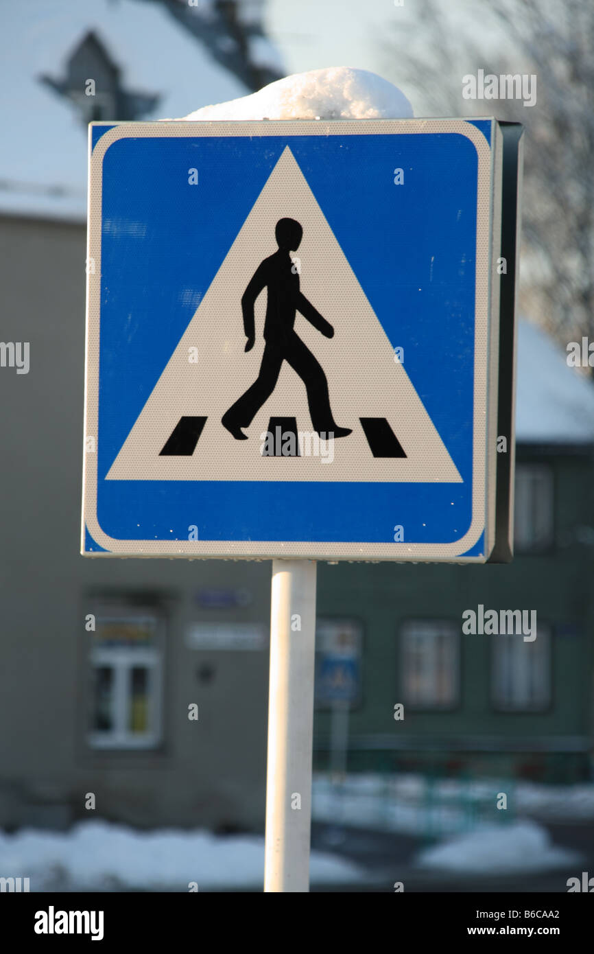 Pedestrian crossing sign covered with snow Stock Photo - Alamy