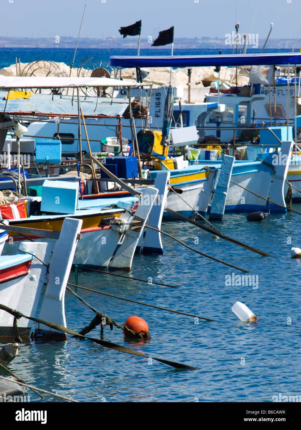 Traditional greek fishing boats hi-res stock photography and images - Alamy