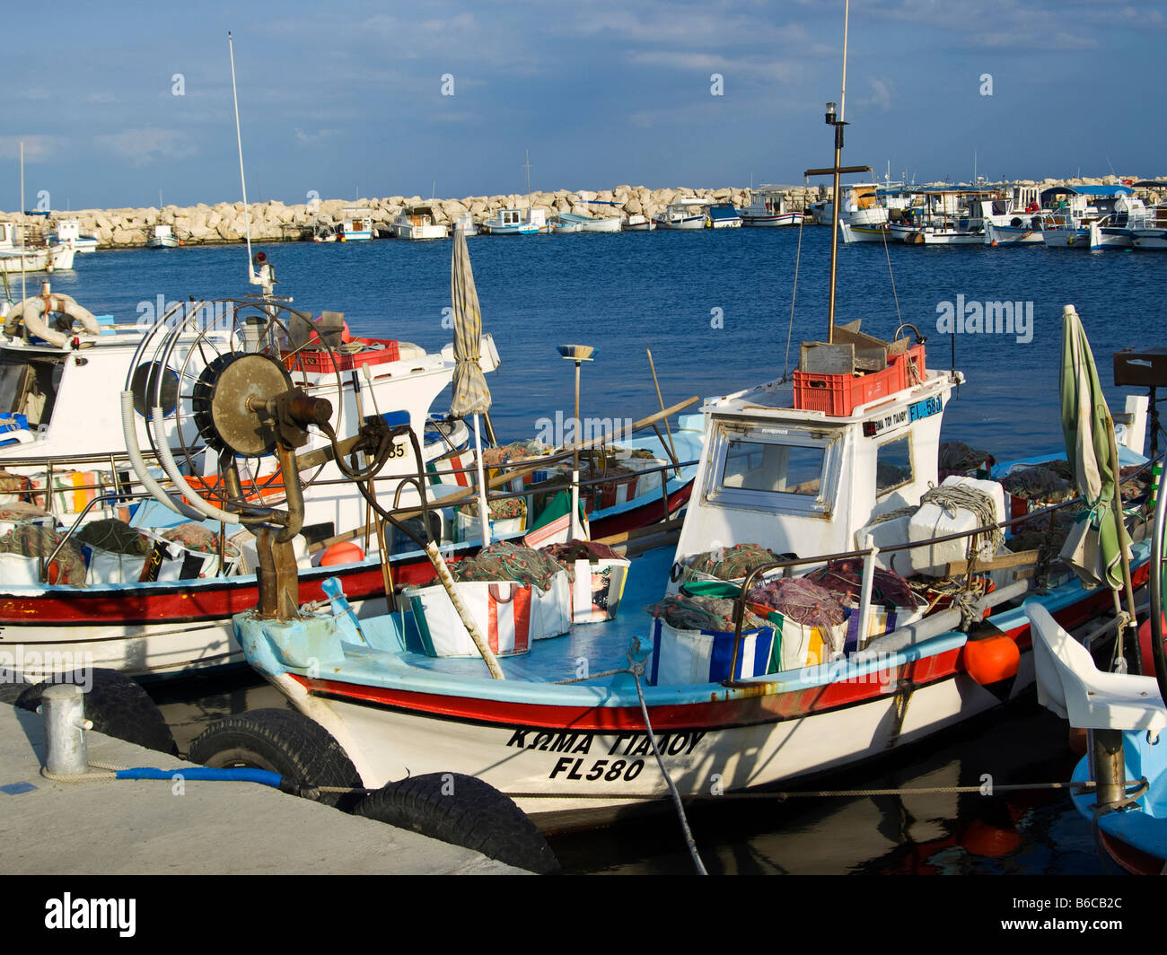 Traditional greek fishing boats hi-res stock photography and images - Alamy