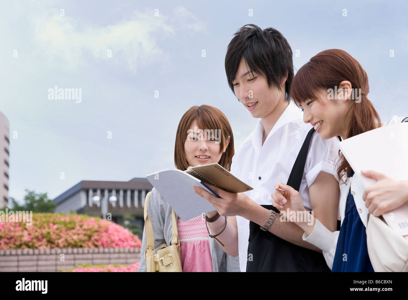 College students talking Stock Photo - Alamy