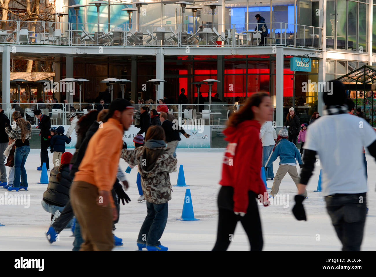Skaters maneuver the packed Pond at Bryant Park ice skating rink in New ...
