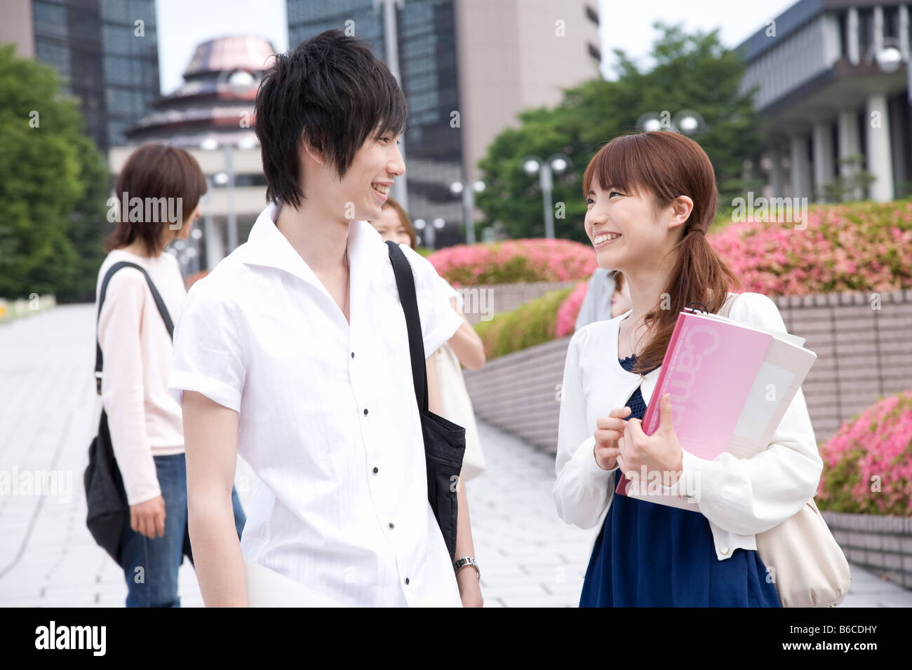 College students talking Stock Photo - Alamy