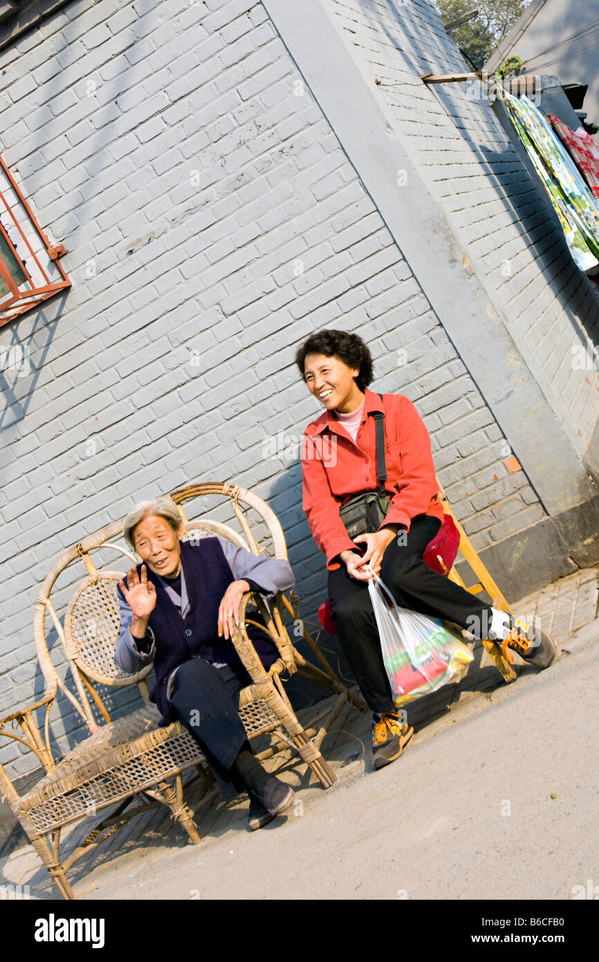CHINA BEIJING Two Chinese women sitting outside their home in the ...