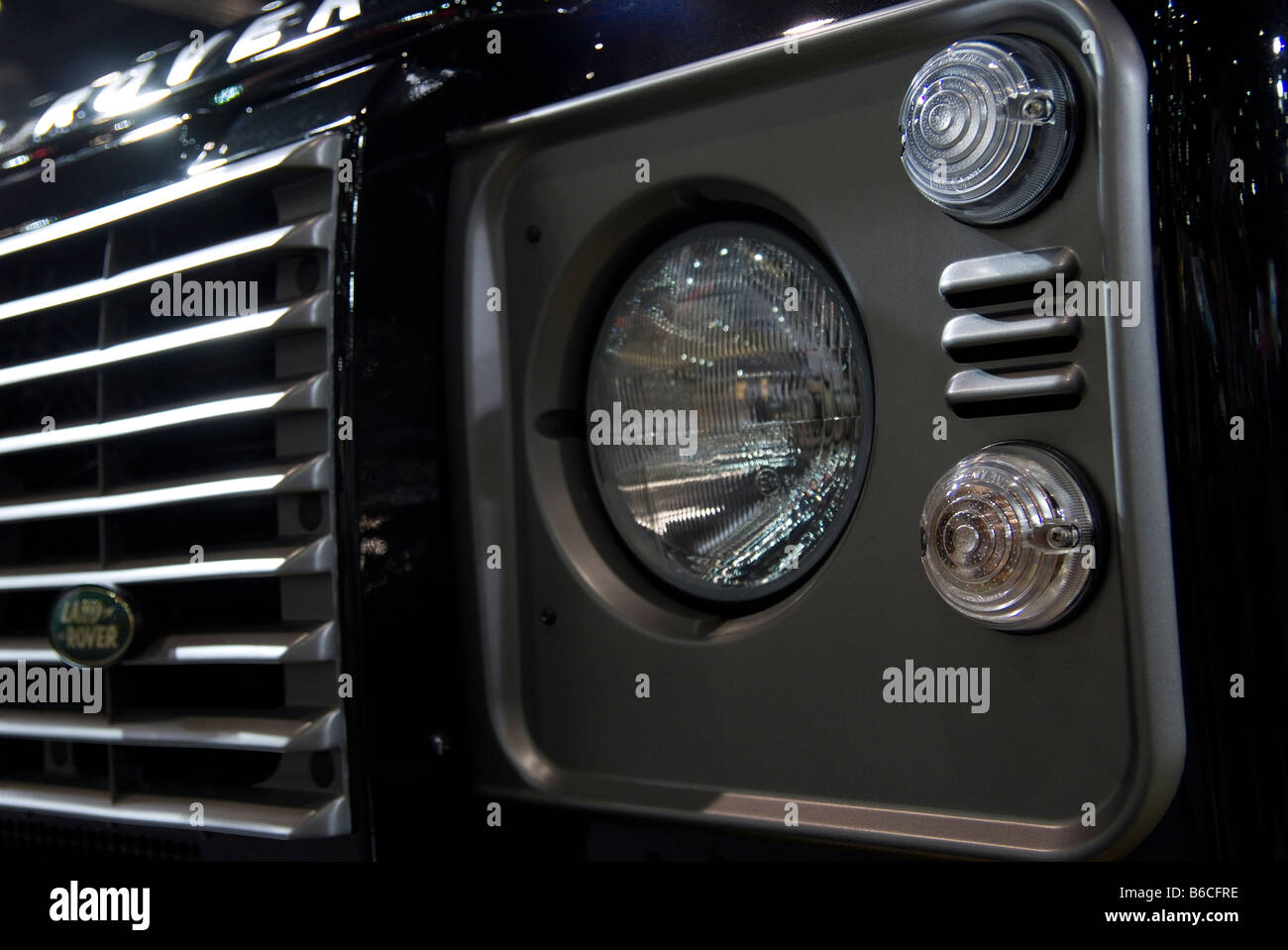 Front detail with headlight of 2008 Land Rover Defender Stock Photo - Alamy