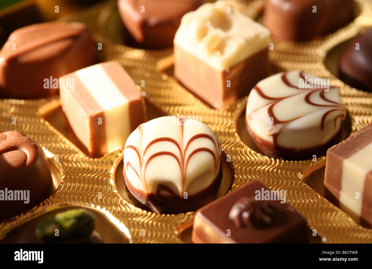 Close-up of chocolate candies in box Stock Photo - Alamy