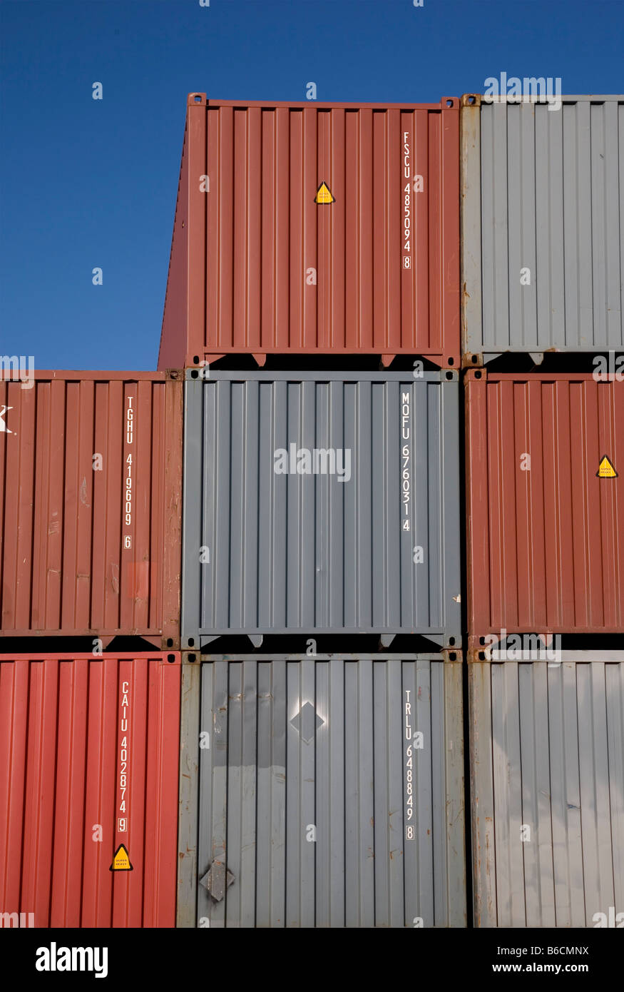 Shipping cargo containers against blue sky Stock Photo - Alamy