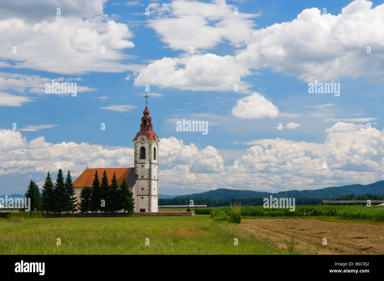 Church in field, Balkan Peninsula, Slovenia Stock Photo - Alamy