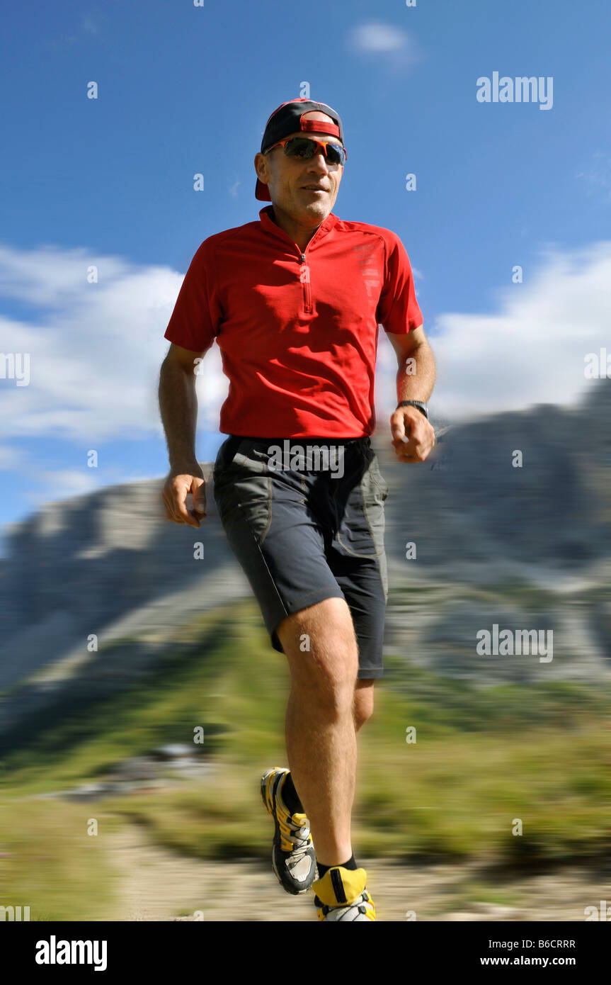 Low angle view of man running Stock Photo - Alamy