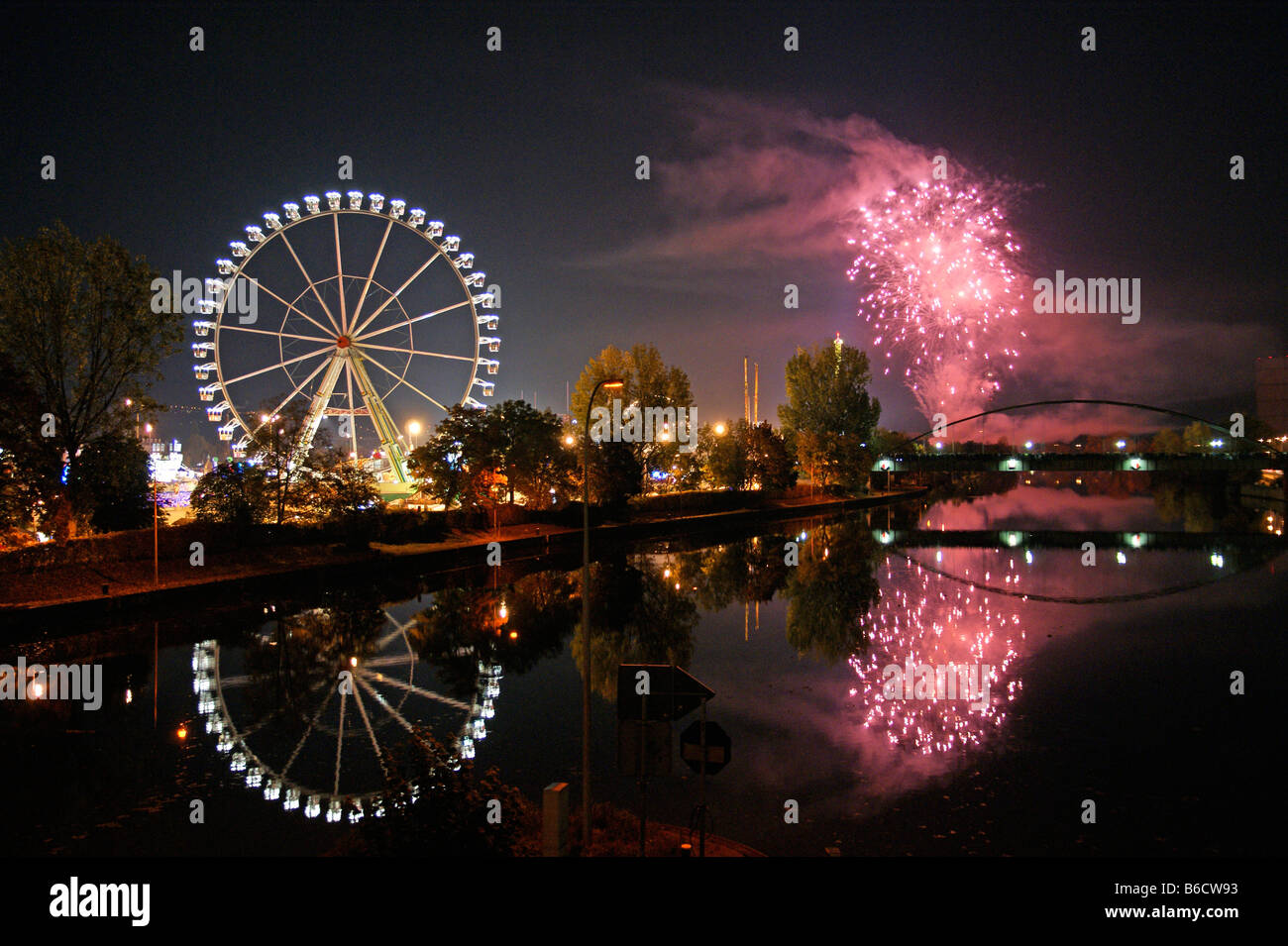 Firework display at fair during night Stock Photo - Alamy