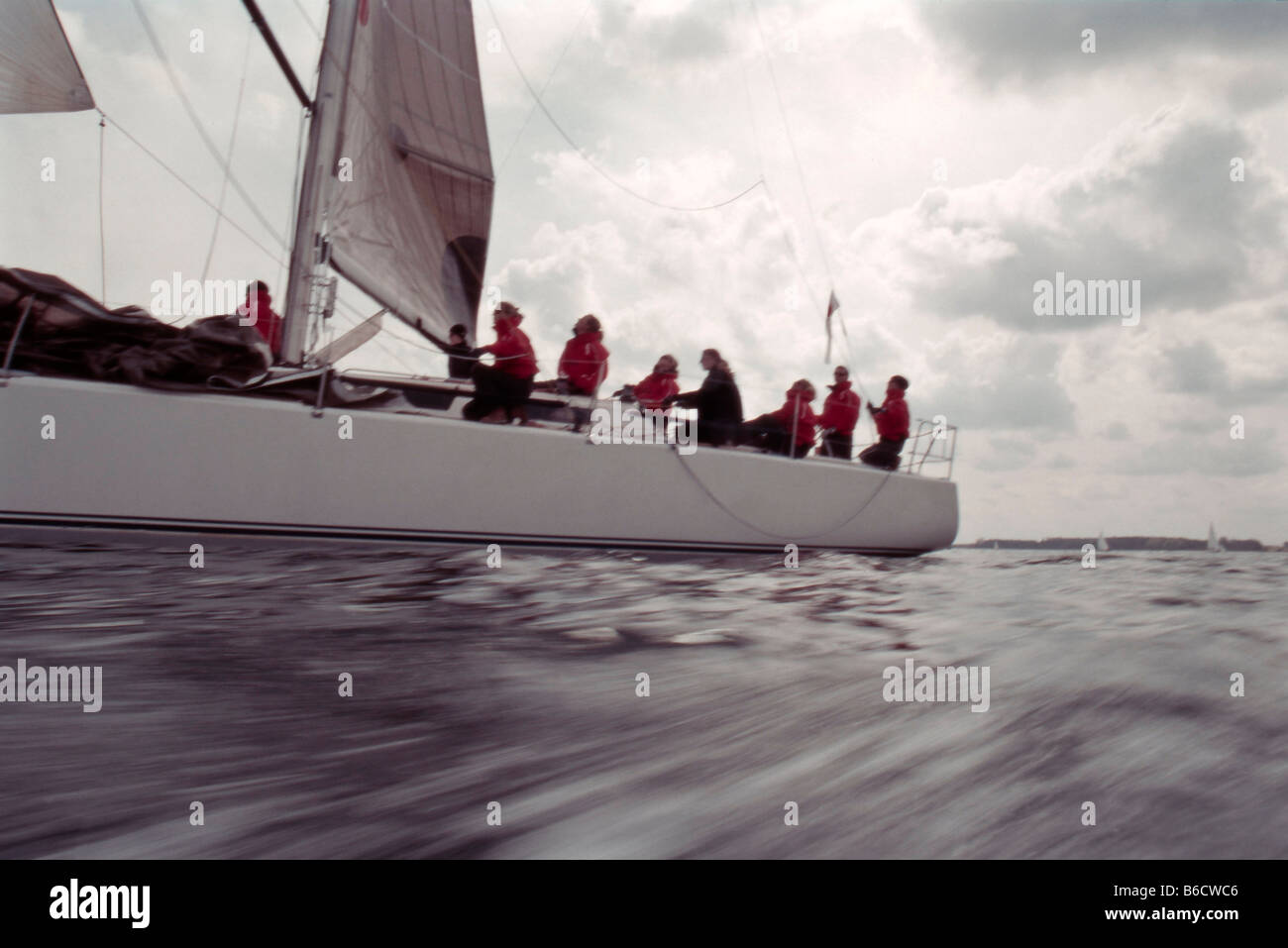 Group of people on sailing ship Stock Photo - Alamy
