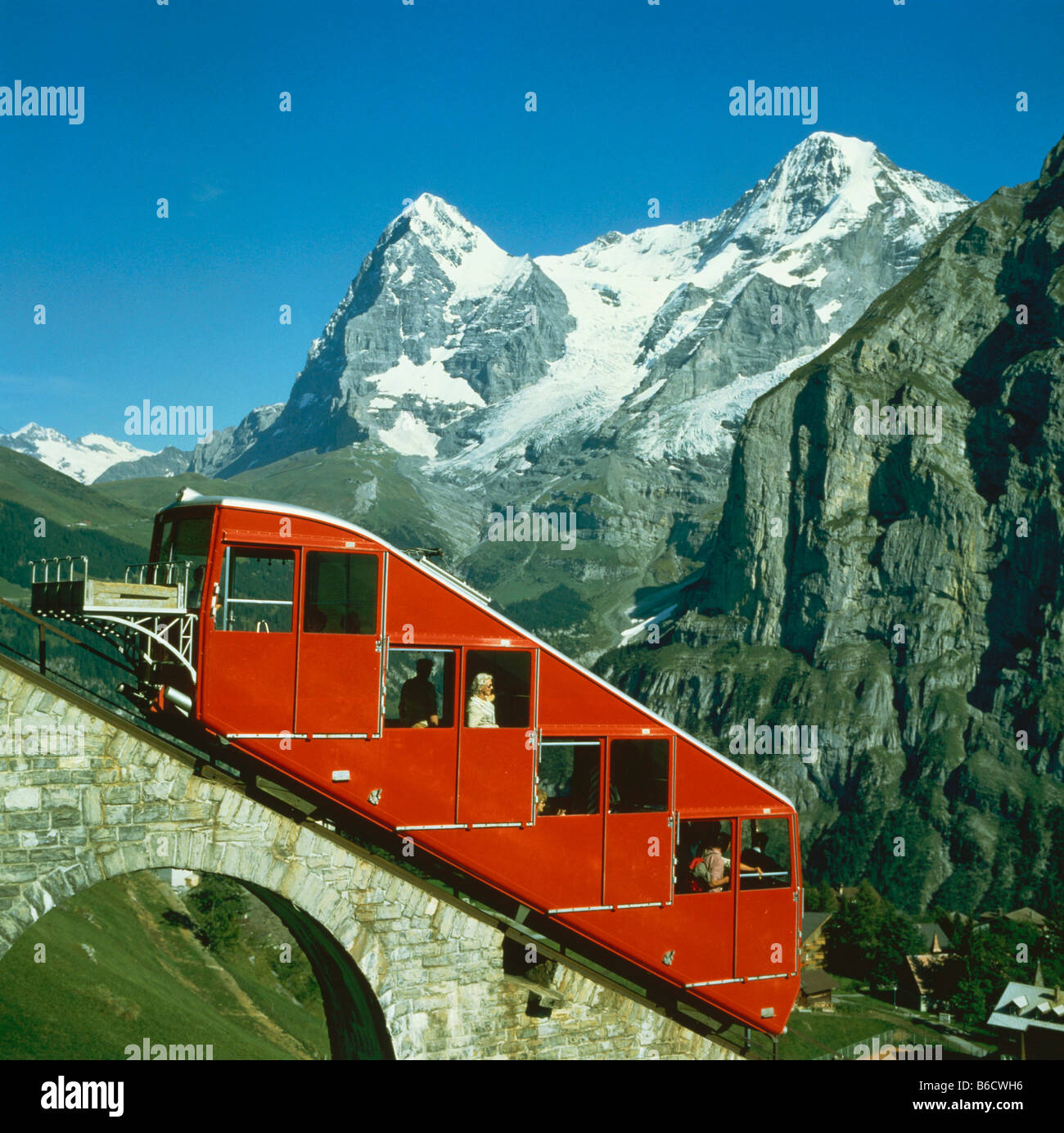 People inside cable car on bridge, Switzerland Stock Photo - Alamy