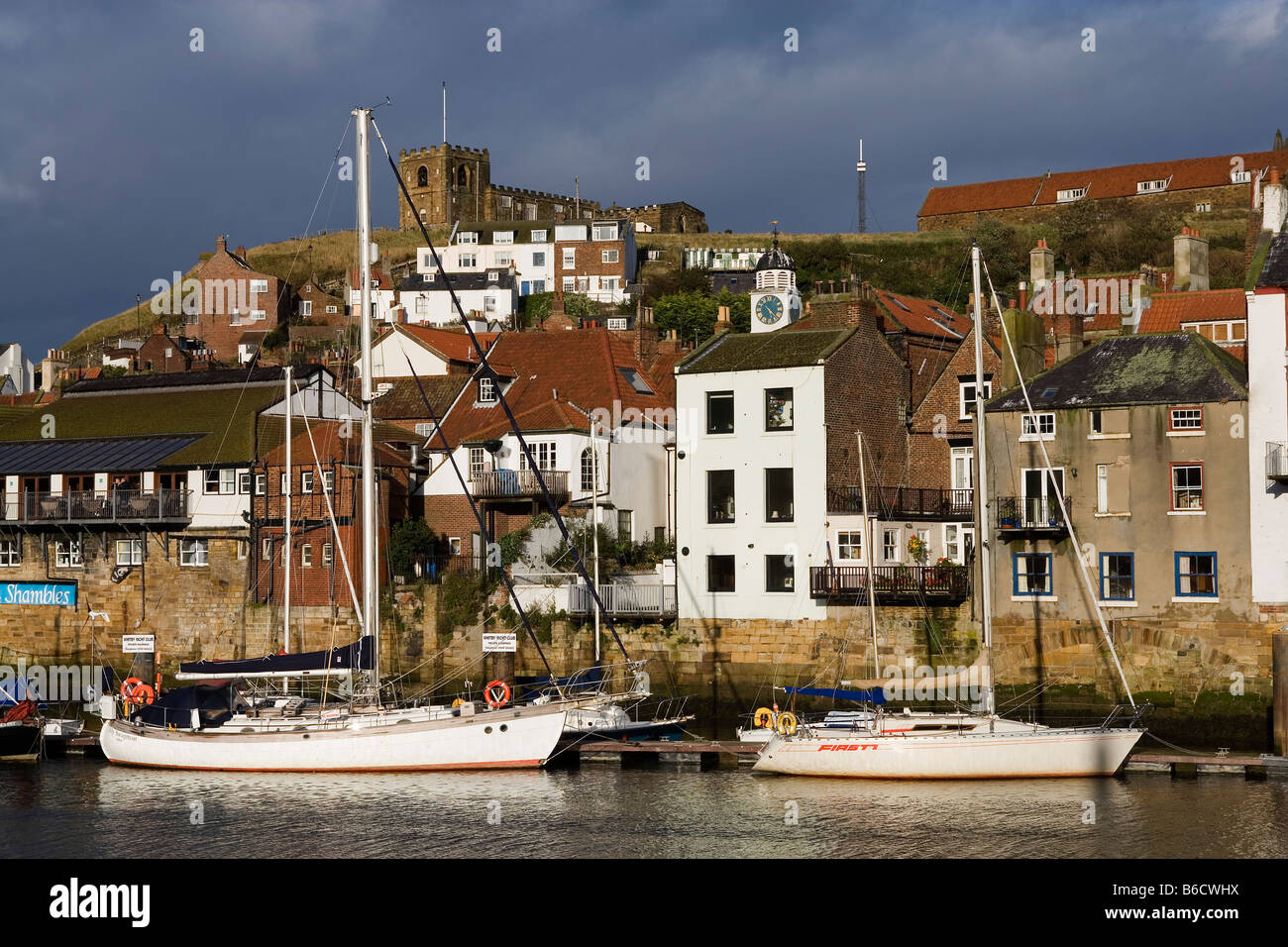 Whitby harbour waterfront quays boats North Yorkshire UK Great Britain ...