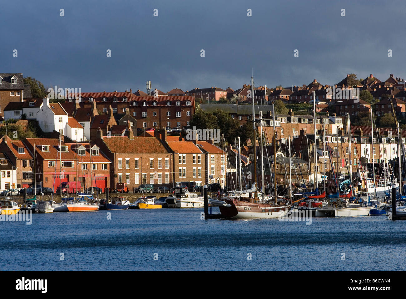 Whitby harbour waterfront quays boats North Yorkshire UK Great Britain ...