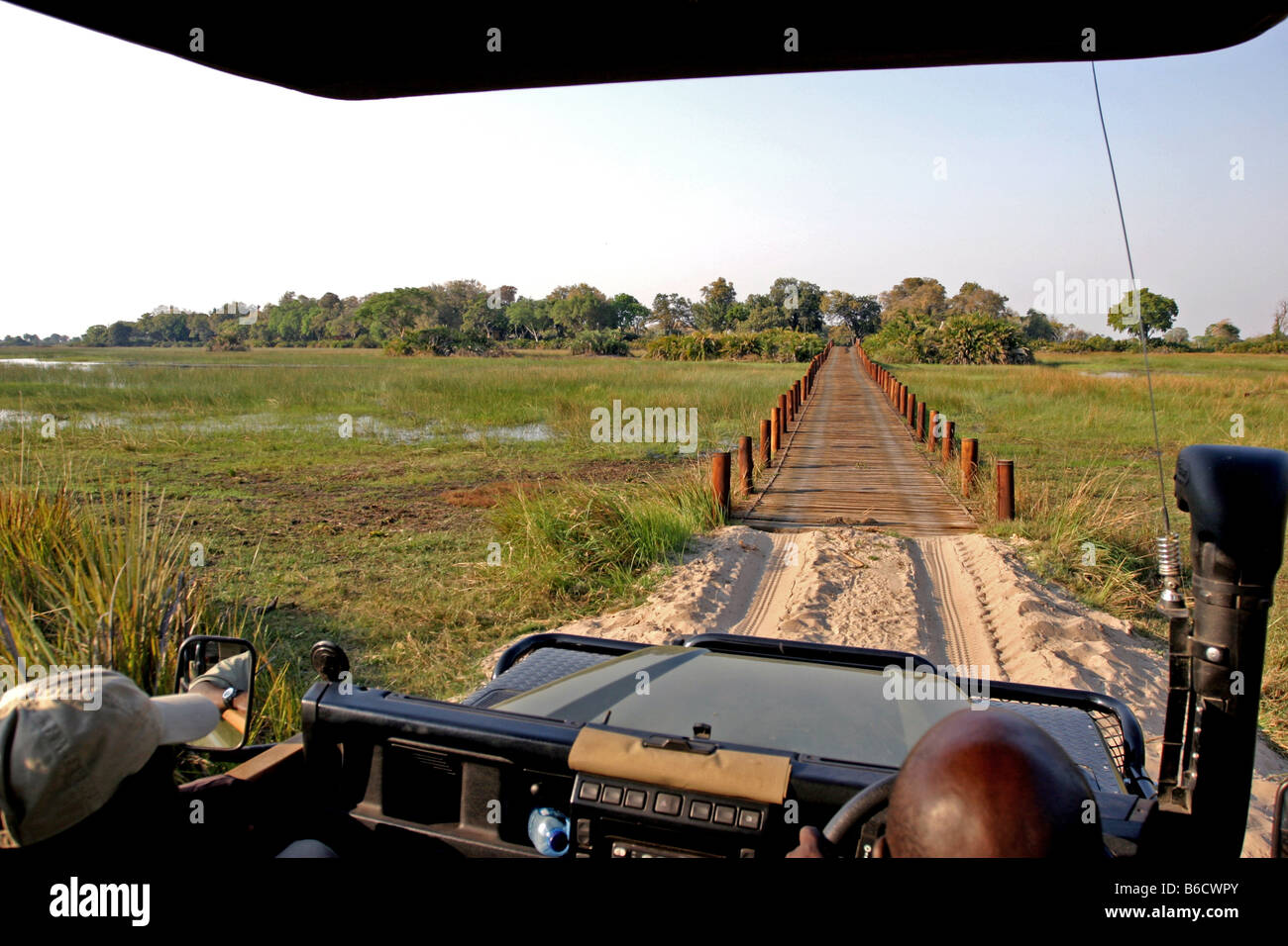 two people driving towards bridge Stock Photo - Alamy