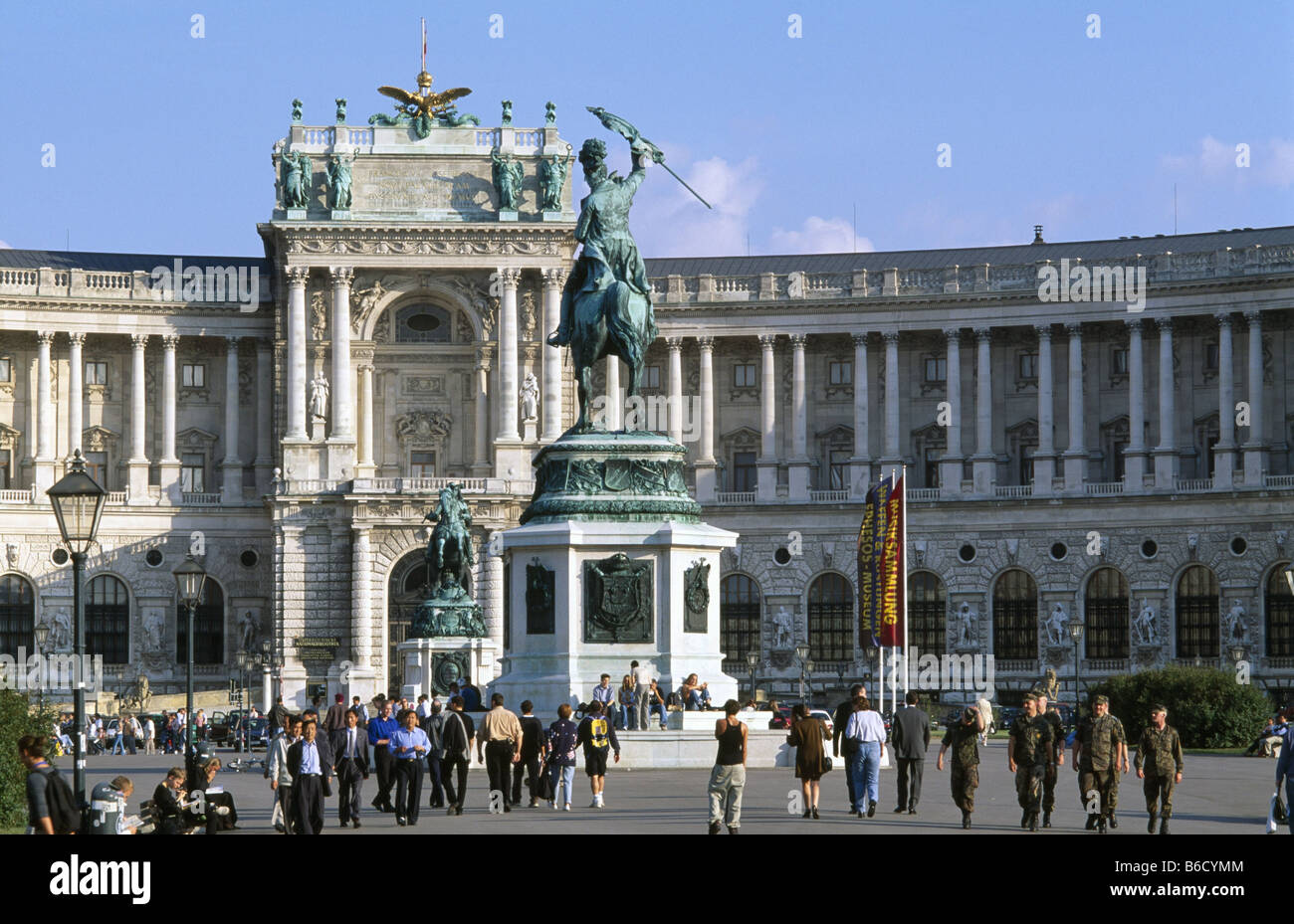 Tourists in front of government building, Neue Burg, Hofburg Complex ...