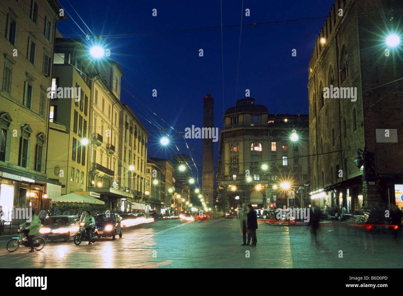 People at street lit up at night Stock Photo - Alamy