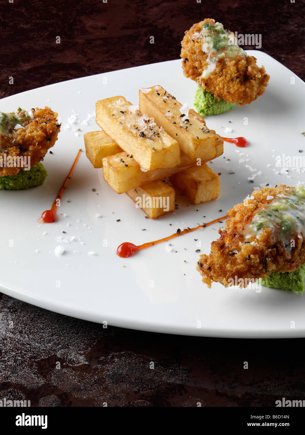 Chicken Kiev stylish fine dining editorial food Stock Photo - Alamy
