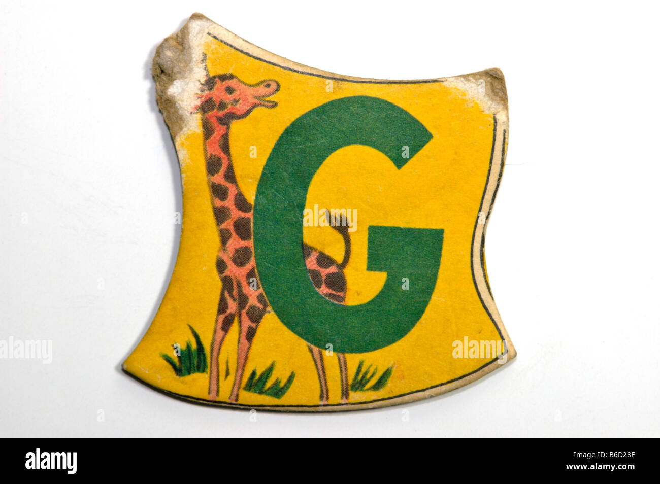 Vintage alphabet letter puzzle piece for children with the letter G and ...