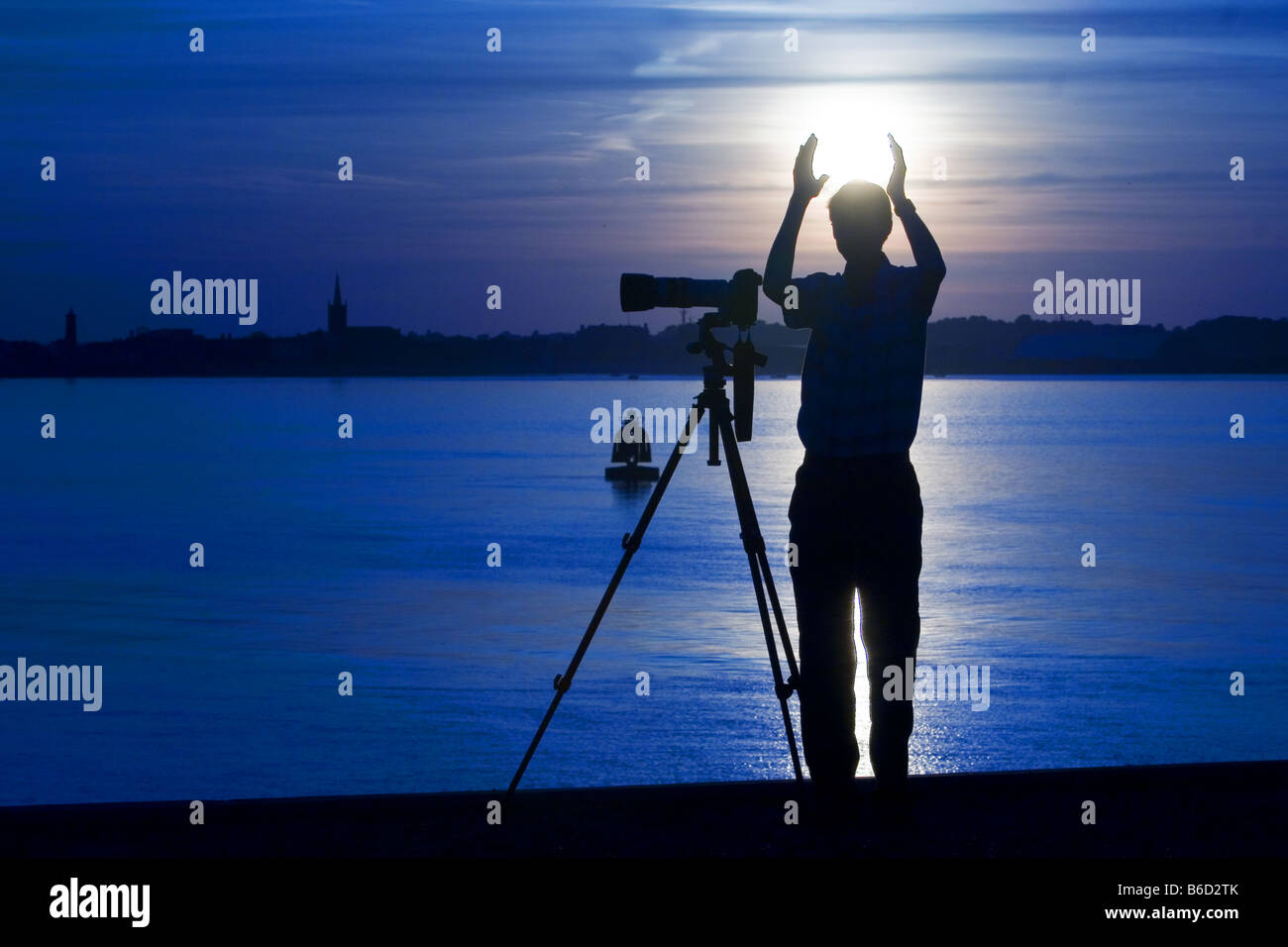 Photographer Catching the light Stock Photo - Alamy