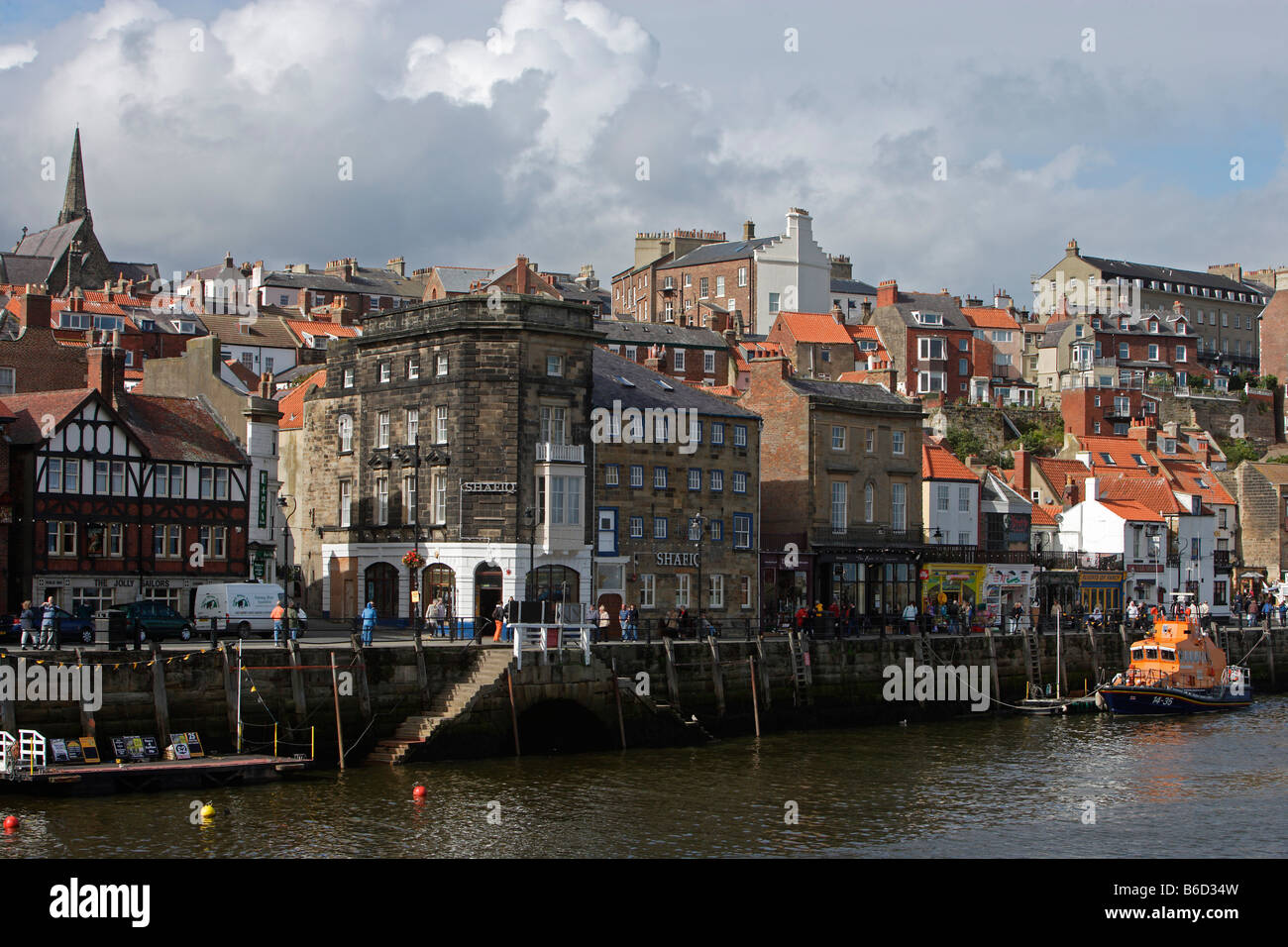 Whitby harbour waterfront quays boats North Yorkshire UK Great Britain ...