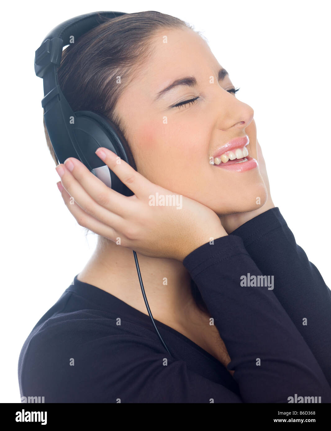Beautiful young lady is listen to the music eyes closed Stock Photo - Alamy