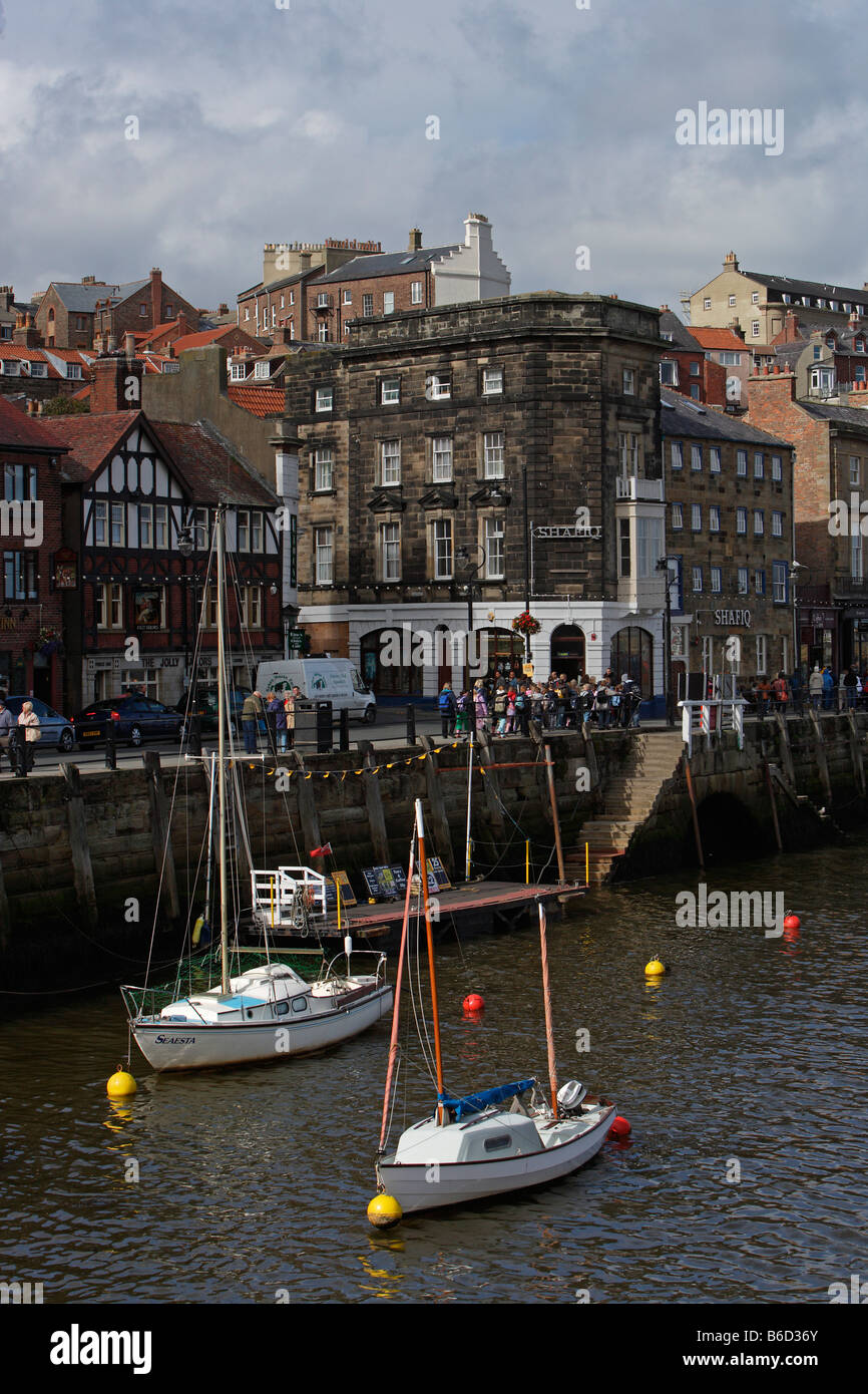 Whitby harbour waterfront quays boats North Yorkshire UK Great Britain ...