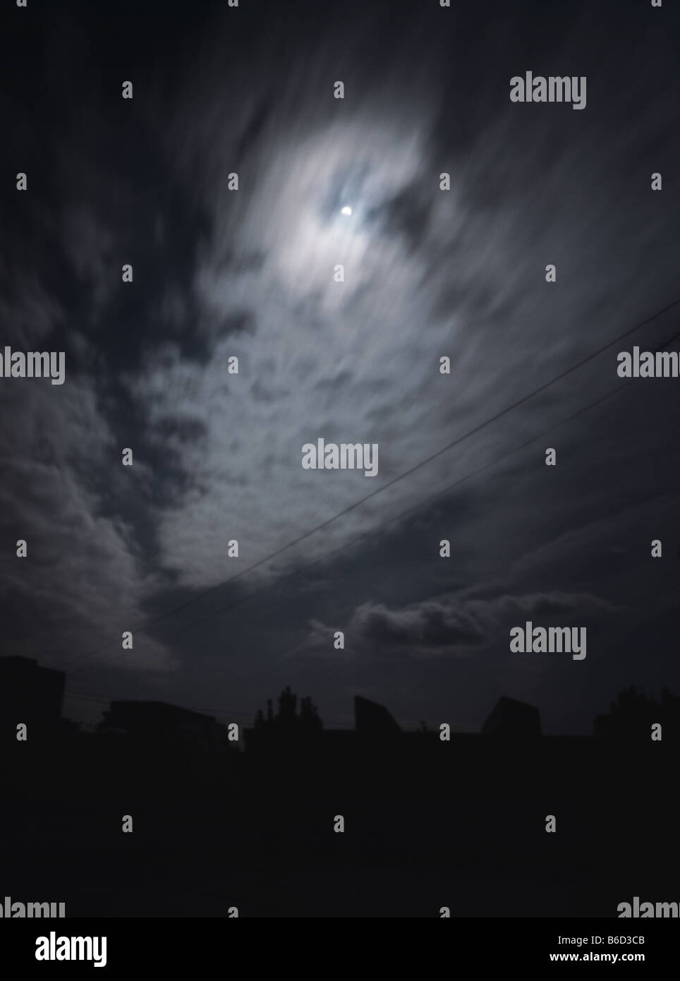 Solar eclipse over buildings in London shot through pinhole camera ...