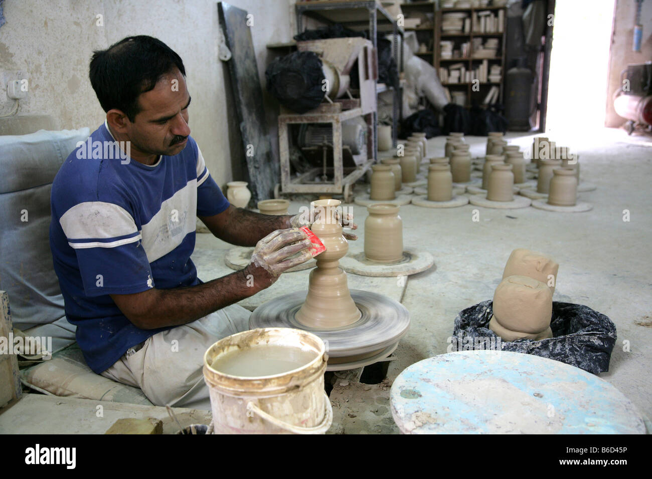 Middle east man pottery hi-res stock photography and images - Alamy