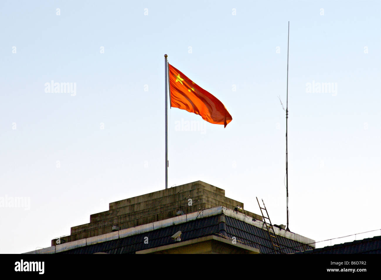 CHINA BEIJING Chinese PRC flag flying on top of the entrance gate to ...