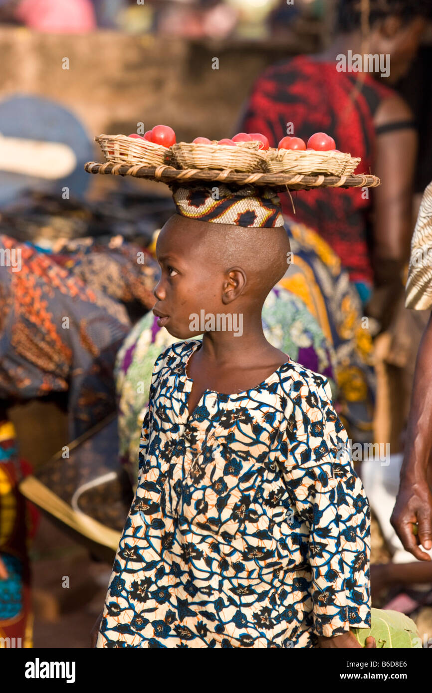Child selling fruits on Abomey market, Benin, West Africa Stock Photo ...