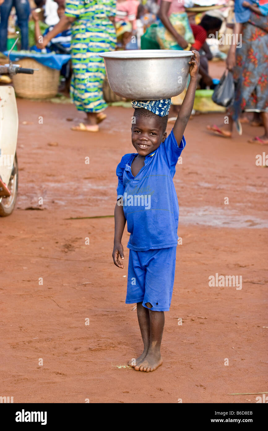 Child selling fruits on Abomey market, Benin, West Africa Stock Photo ...