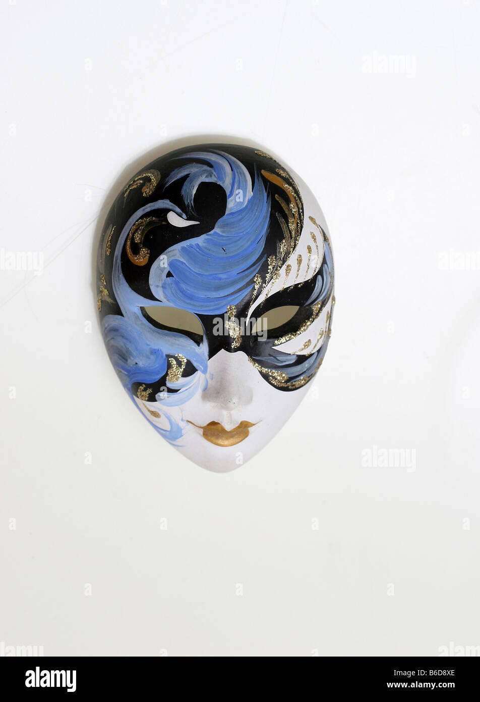 Decorated mask on white background Stock Photo - Alamy