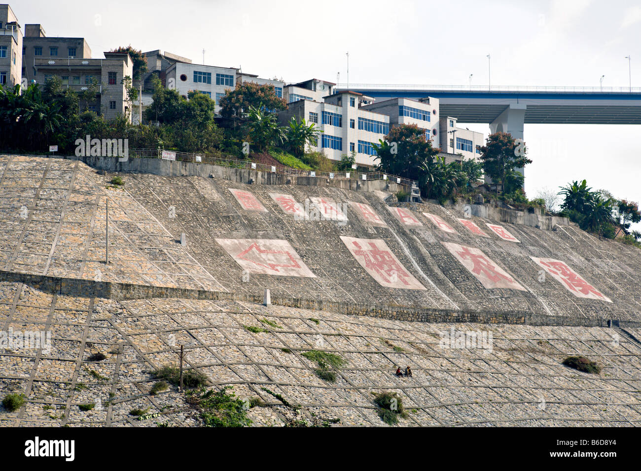 CHINA YANGTZE RIVER Signs on the paved river bank at the first of the ...