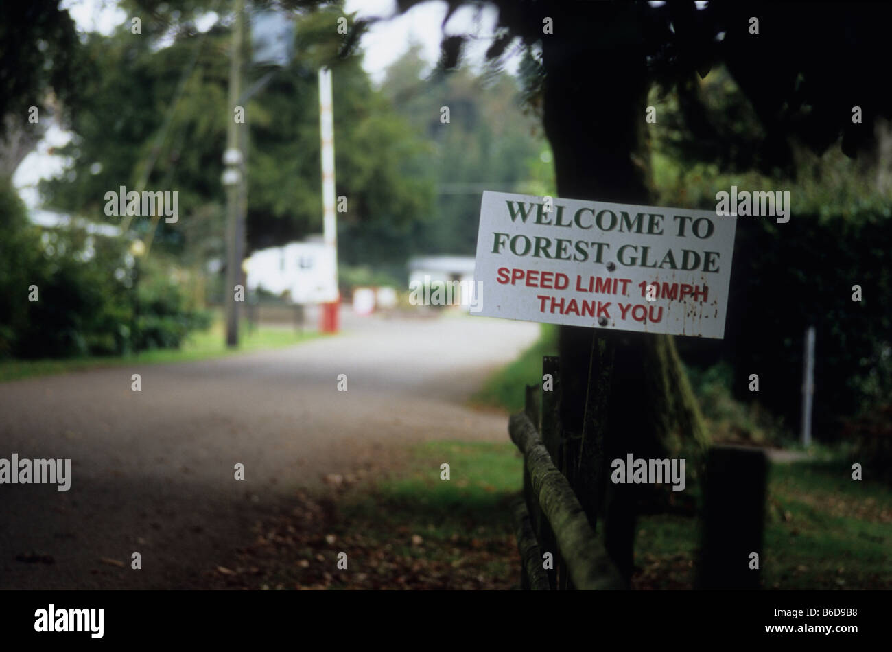 Welcome sign to UK campsite with speed limit Stock Photo - Alamy
