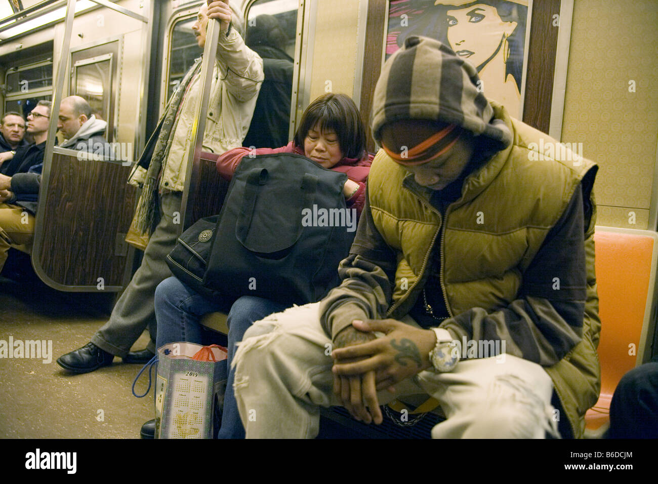 People sitting on nyc subway train hi-res stock photography and images ...