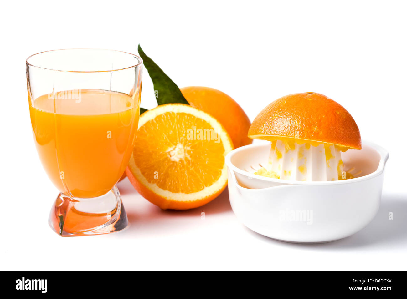 Squeezing orange juice Cut Out Stock Images & Pictures - Alamy