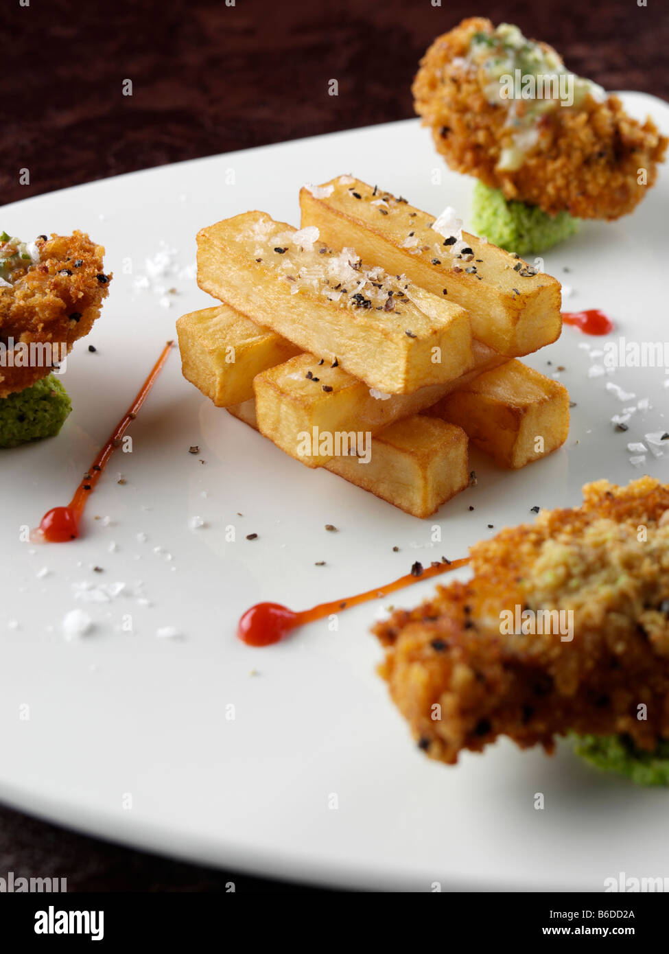 Chicken Kiev stylish fine dining editorial food Stock Photo - Alamy