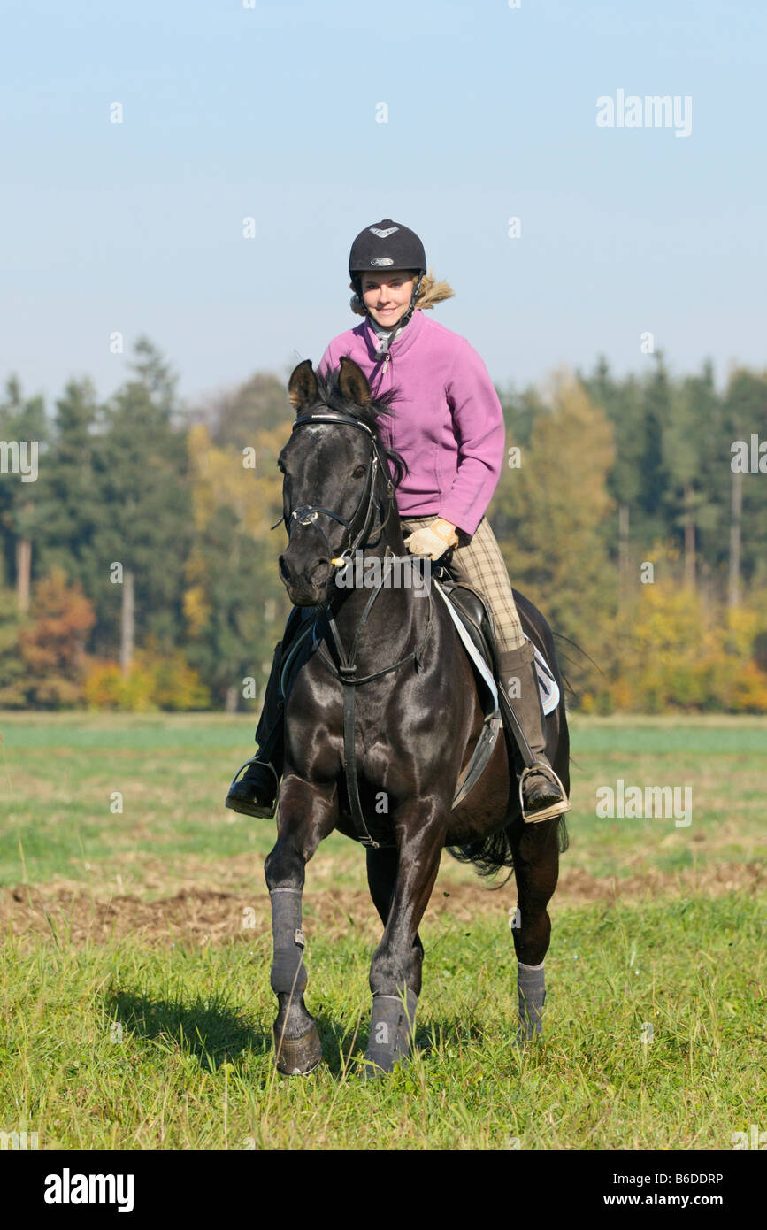 Horse rider galloping hi-res stock photography and images - Alamy