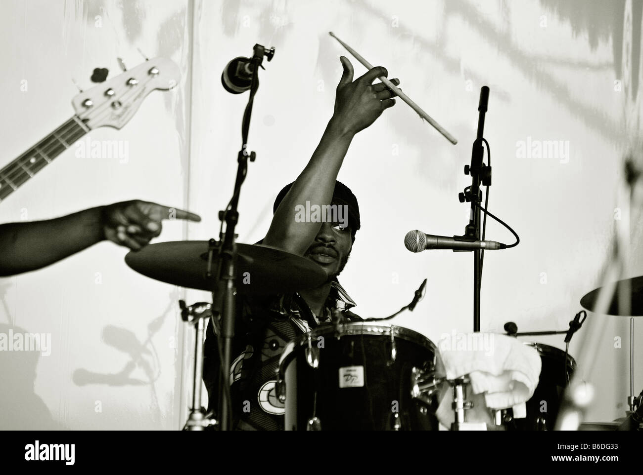 Silhouette of drummer spinning drumstick Stock Photo - Alamy