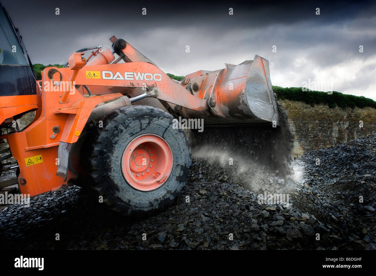 Extracting the raw material at the Achscrabster Quarry Stock Photo - Alamy