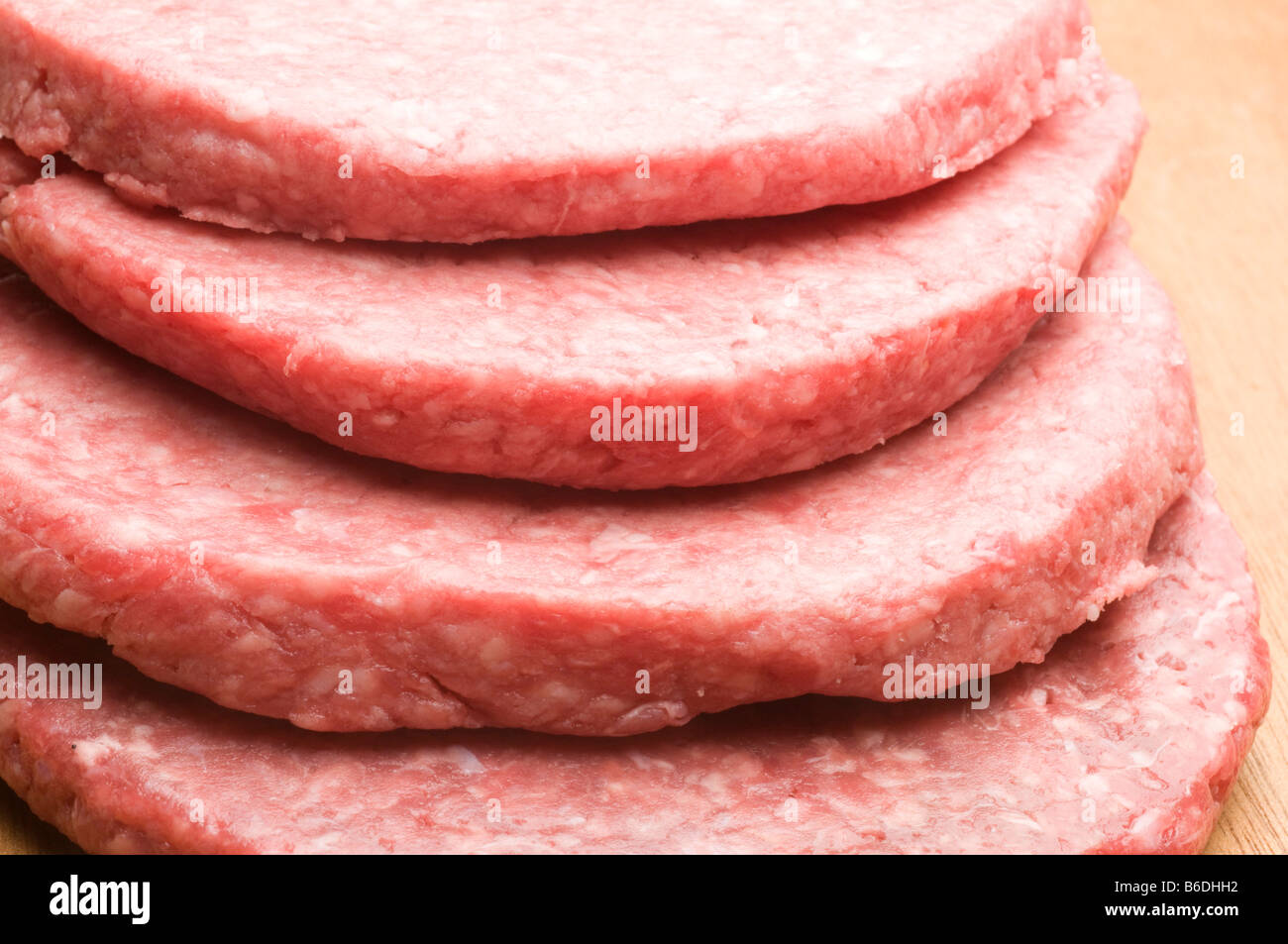 hamburger chopped meat patties raw 1 4 pound Stock Photo - Alamy