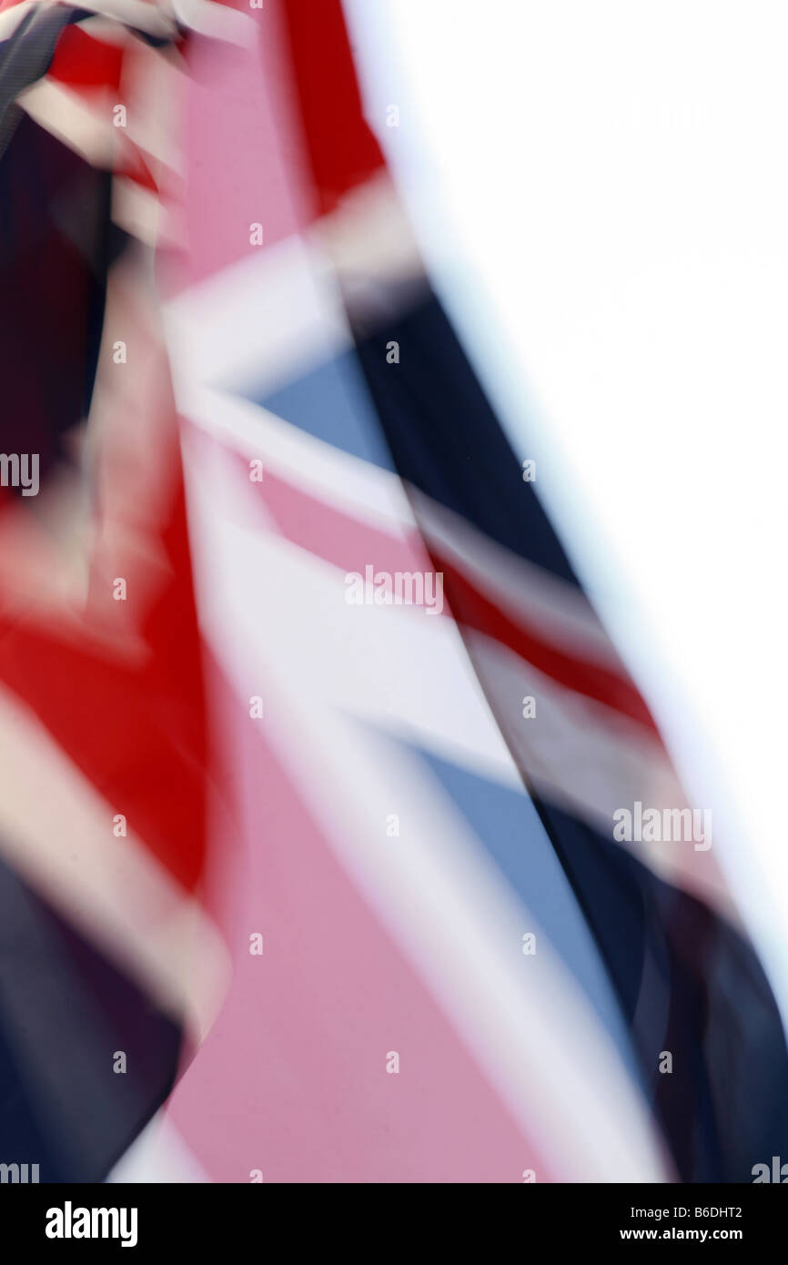 abstract union jack flag flying in wind in sun Stock Photo - Alamy