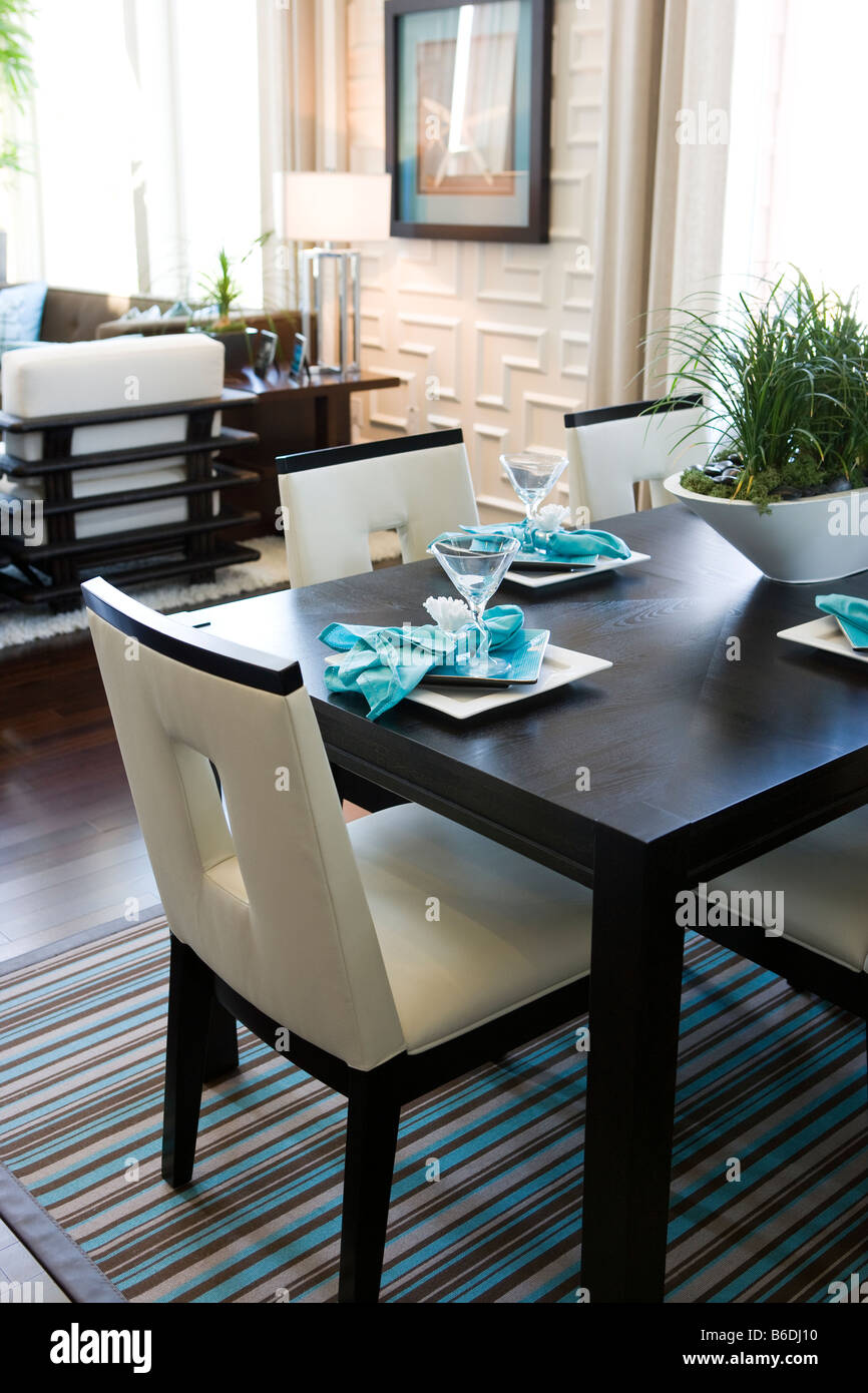 Contemporary dining area in loft style condo Stock Photo - Alamy