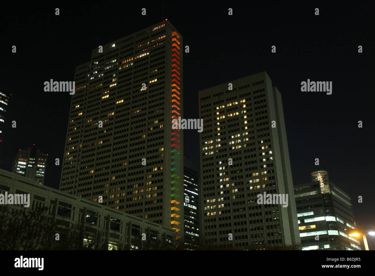 The lights in the rooms of a skyscraper create an image of a musical ...