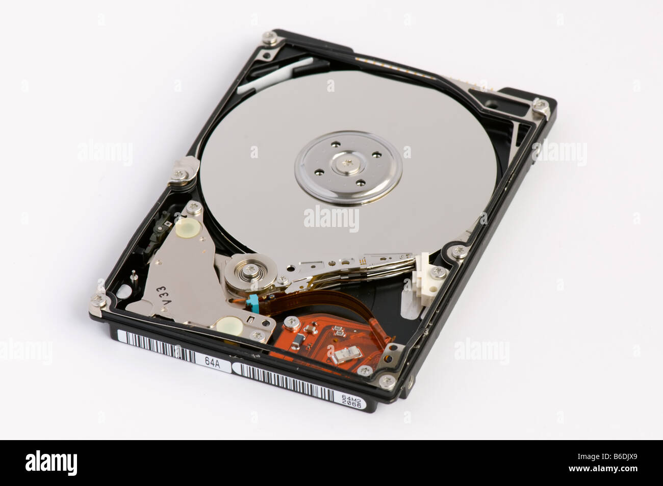 Opened hard disk showing the disk surface and drive head Stock Photo ...
