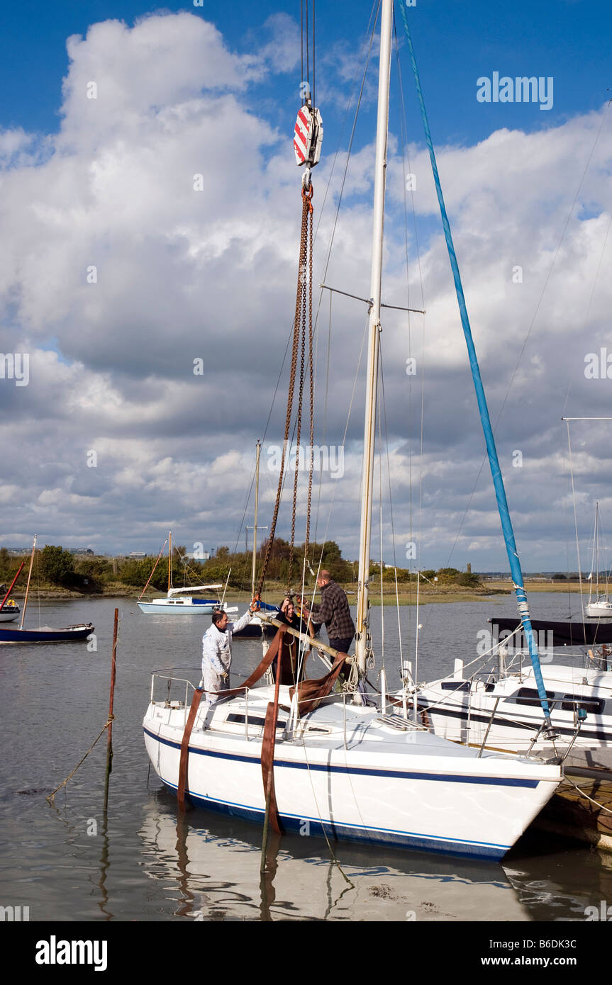 Lifting boats out of the water for the winter at ashlett sailing club ...