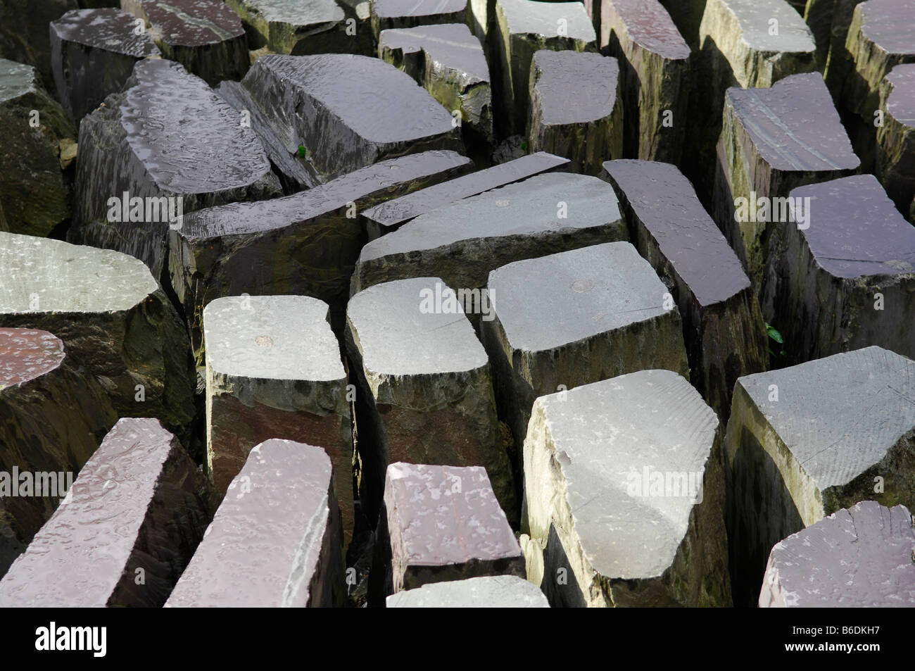 wet stones pebbles slate cobbles sculpture manchester millenium square ...