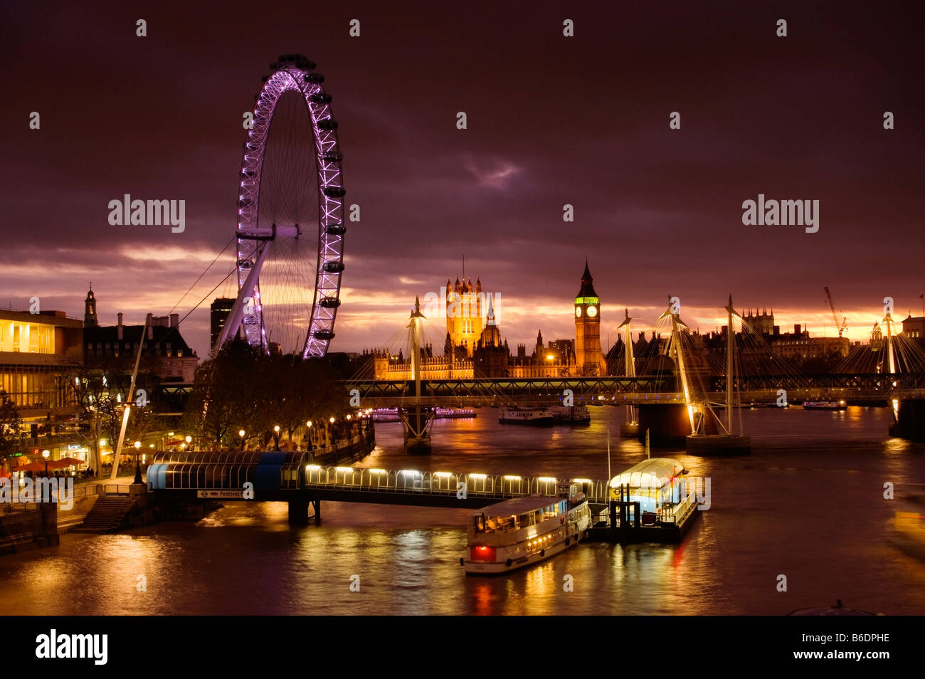 Evening view from Waterloo Bridge of the Thames and London Eye with ...